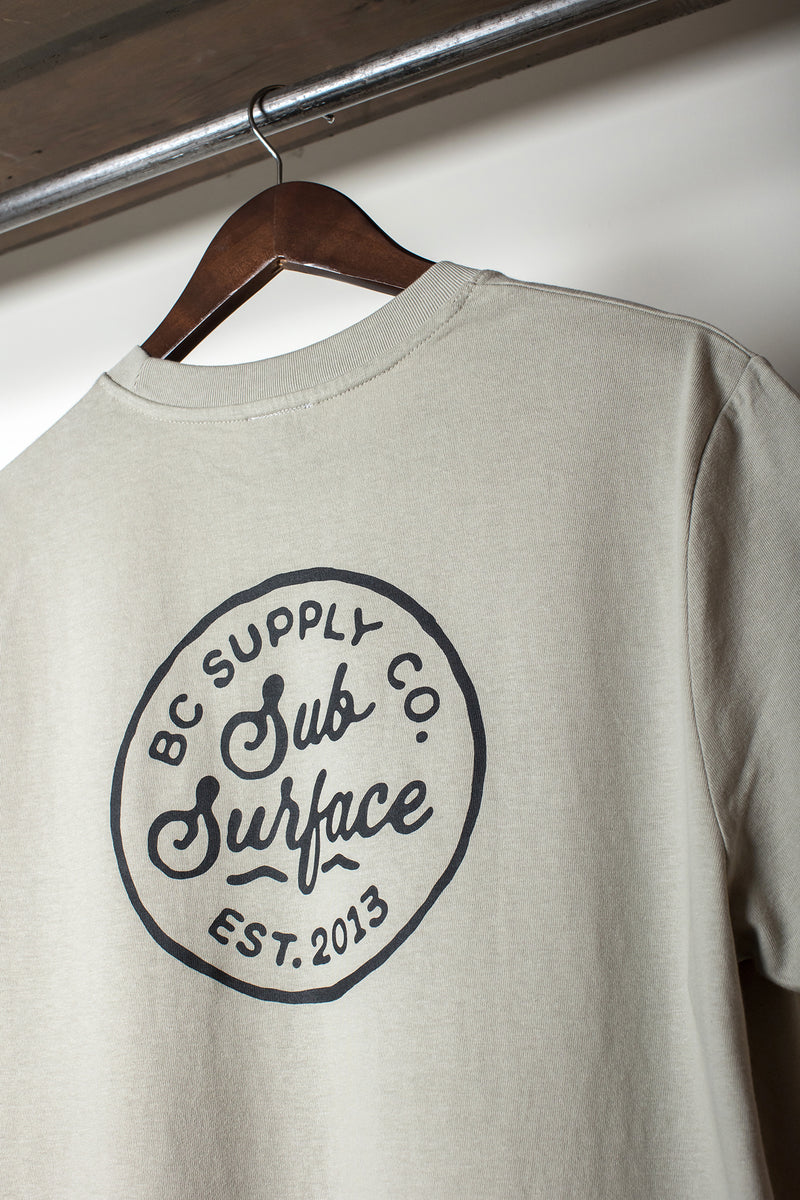 'SUPPLY CO' Tee | Stone – Subsurface Journal