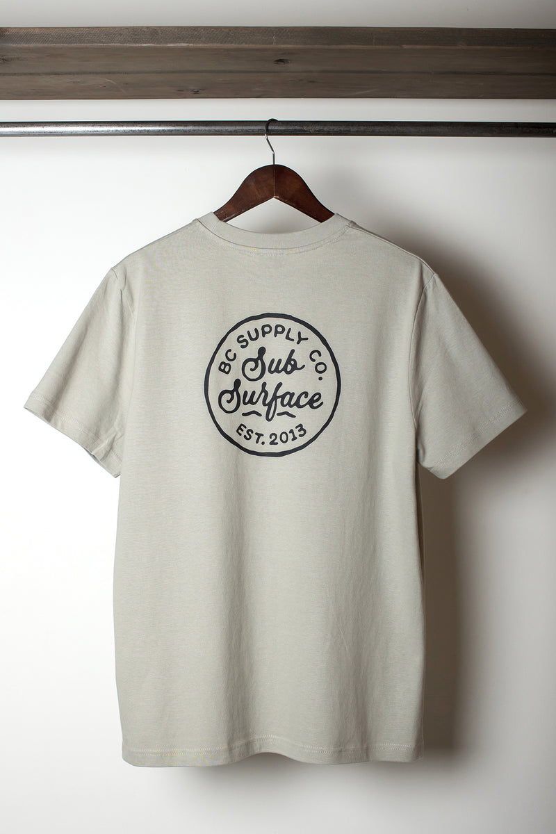 'SUPPLY CO' Tee | Stone – Subsurface Journal